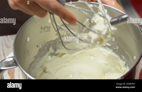 Electric Mixer Is Whipping Cream Cheese And Powdered Icing Sugar Stock