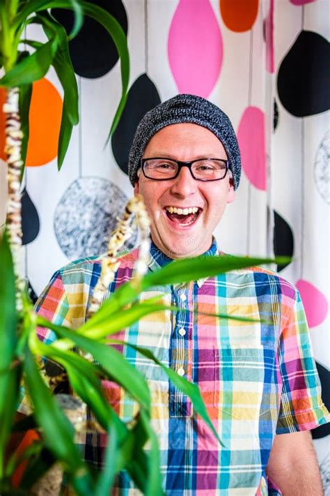 Laughing Nerd Looking From Behind Green Plant Stock Image Image Of Face Comic 66816619