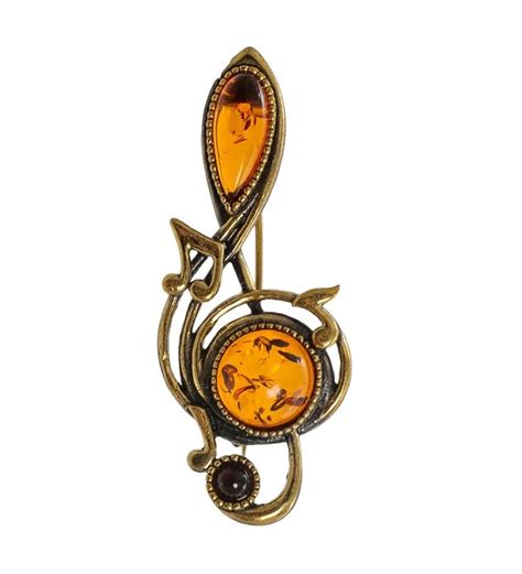 Фигурка брошь «Скрипичный ключ с нотами Am 1958 латунь янтарь Скрипичный ключ Янтарь Латунь