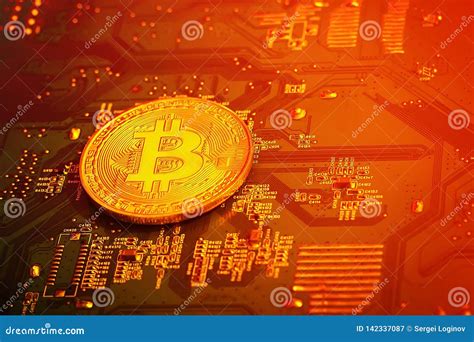 Concept Of Bitcoin Mining Golden Bitcoin On The Microchip Board Close Up Orange Background