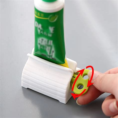 Прес дозатор зубної пасти крему Диспенсер видавальник для пасти крему клею ціна 36