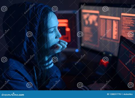 Hooded Hacker Girl Is Thinking About The Problem Of Hacking Or Malware Infection The Concept Of