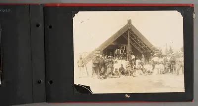 Large Group Portrait Of Maori And Pakeha In Front Of A Whare