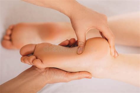 Close Up Female Foot While Massage Special Tehnic Of Foot Massage