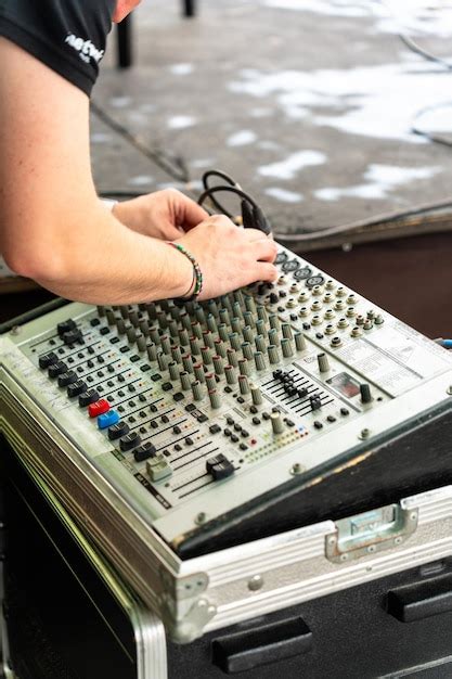Premium Photo Sound Engineer Working With A Professional Sound Console