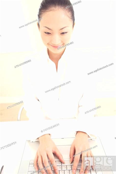 Office Lady Operating A PC Stock Photo Picture And Royalty Free Image Pic ATO U14785483