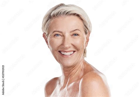 Portrait Of A Happy Mature Caucasian Woman Posing Topless Against Pink Background Copyspace