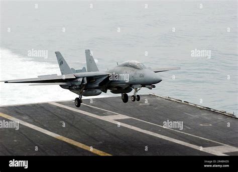 Us Navy An F 14d Tomcat Prepares To Make An Arrested Landing On The Flight Deck Of The Nimitz