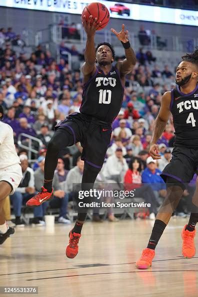 Tcu Horned Frogs Guard Damion Baugh Goes To The Basket During The