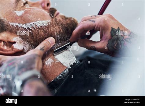 To Beard Or Not To Beard An Unrecognizable Man Getting His Beard