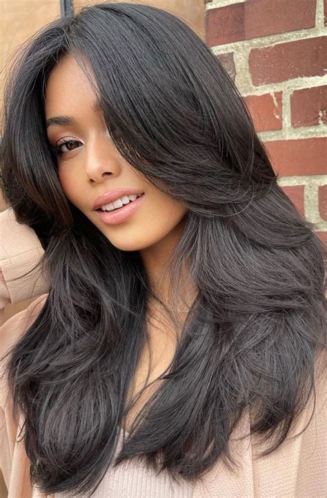 50 Versatile Layered Haircuts Rich Brunette Middle Part Layered Haircut