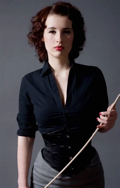 Redhead Dominatrix Scrolller