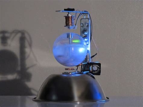 a levitating sphere rotates glows and blinks with arduino duino