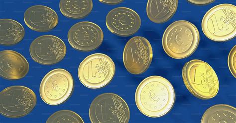 파란색 표면 위에 앉아 있는 금화 그룹 사진 Unsplash의 유로 이미지