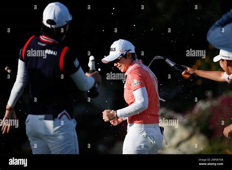 South Koreas Jeong Eun Lee Left And In Kyung Kim Spray Champagne On