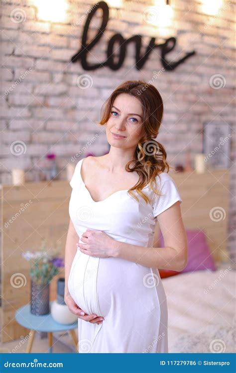 Pregnant Beautiful Woman Wearing White Dress Holding Belly Inscription