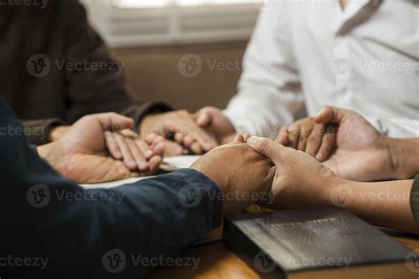 A Group Of Young Christians Working Together To Pray And Seek Blessings