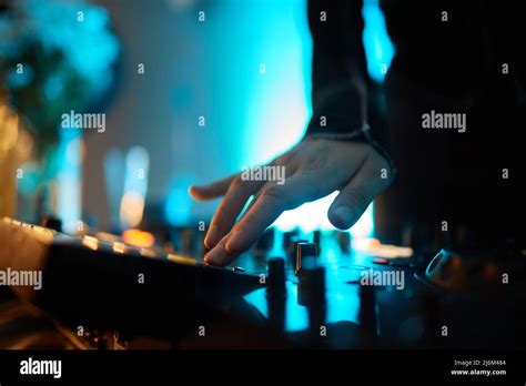 Hands Of Female Dj Playing Music On Modern Midi Controller Turntable Digital Device For Mixing