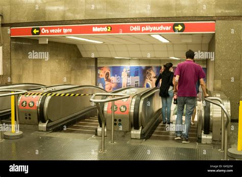 Passengers On The Escalators At One Of The Metro Stations In Budapest