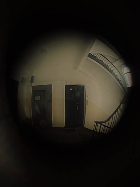 Mysterious Reflection In Circular Mirror