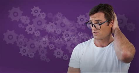 Confused Man Wearing Glasses Holding His Head With Cogs Pattern Stock