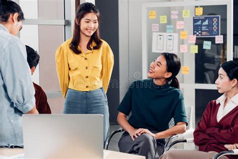 Asian Ux Developer And Ui Designer Casual Meeting About Mobile App Interface Design On