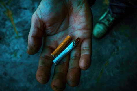 Premium Photo Man Choosing Between Two Types Of Cigarettes