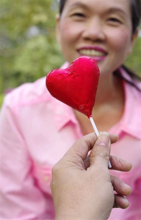 Woman With Red Candy Stock Image Image Of Holiday Candy 65798151