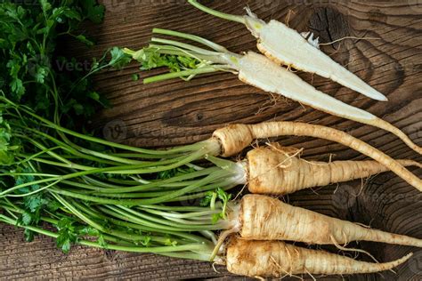 Heap Roots Parsley With Leaves On Wooden Background Stock Photo At Vecteezy