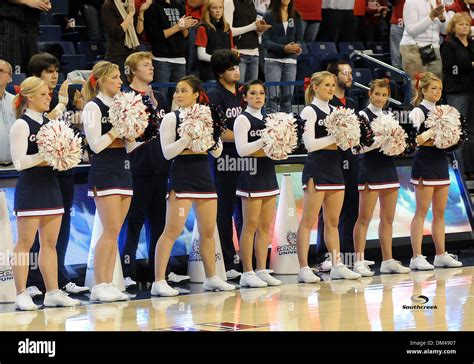The Gonzaga Cheer Squad Stand For The Nation Anthem Before A Ncaa Women