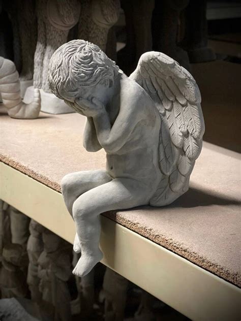 Crying Cherub Statue
