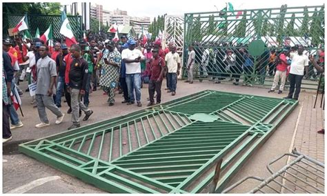 Protesting Workers Pull Down National Assembly Gate Kemi Filani