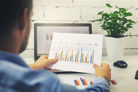 Man Working With Business Statistics Data Stock Image Image Of