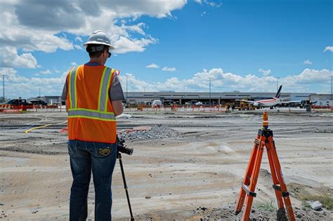 Conducting Site Surveys For New Terminal Construct Generative Ai Premium Ai Generated Image