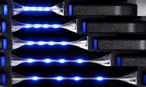 Low Cost And Scalable Process For Microchips Integration Into Stretchable Printed Circuits