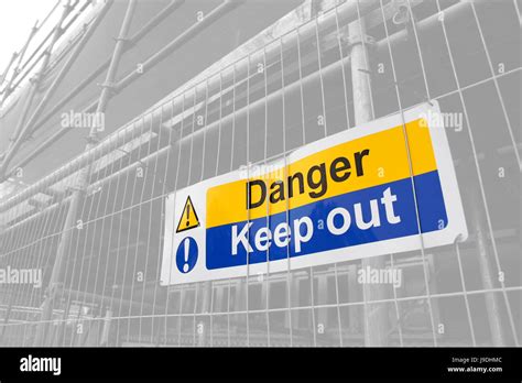 Danger Out Fence Fence In Fencing Keep Warning Sign Security Safety Stock Photo Alamy