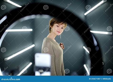 Beautiful Teenage Girl Taking A Selfie Picture With Mobile Phone In