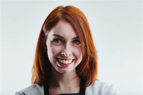 Joyful Redhead In A Stylish White Jacket Beams A Bright Smile H Stock Photo Image Of Charming
