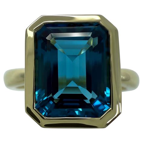 200 Carat Swiss Blue Topaz Emerald Octagonal Cut Yellow Gold Solitaire