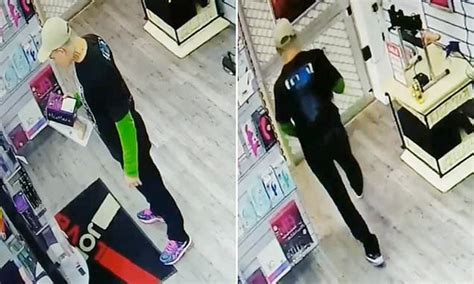 A Tattooed Man In Pink Shoes Has Been Spotted Walking Out Of An Adult Store With A Sex Toy