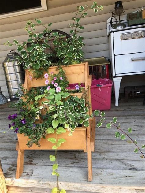 3 Tier Planter Stand With 3 Planters Braced So That It Will Last For
