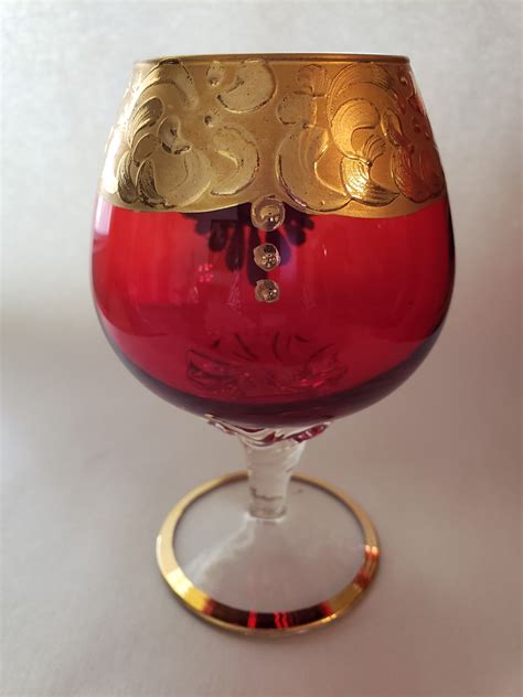 Ruby Glasses Antiques Board