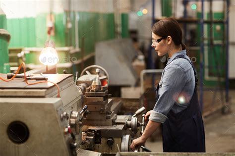 Industrial Laborer Using Manual Lathe Stock Photo By Media Photos Photodune