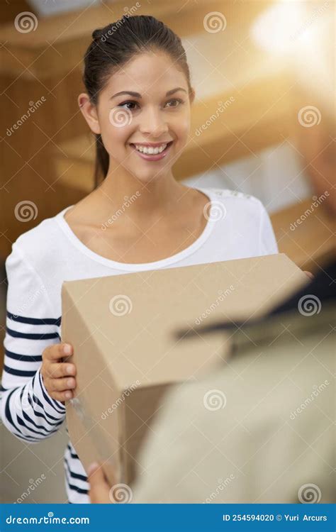 Leaving Another Satisfied Customer With A Big Smile A Young Woman