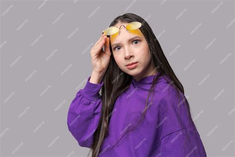 Premium Photo Portrait Cute Teenage Girl In Purple Sweatshirt And