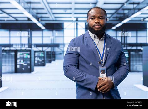 Engineer In Server Room Implementing And Maintaining Security Measures