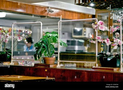 Plexiglass Screen Installed In A Restaurant For The Protection Of Staff And Customers And