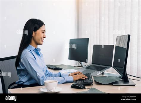 Asian Young Female Programmer Working Developer Programing On A Computer Code At Office Stock