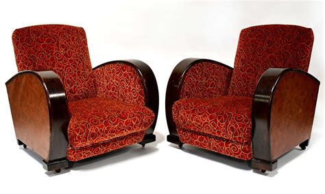 Two Art Deco Armchairs With Curved Wooden Arms With