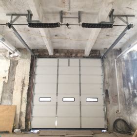 Low Headroom Sectional And Roll Up Overhead Doors For Tight Spaces